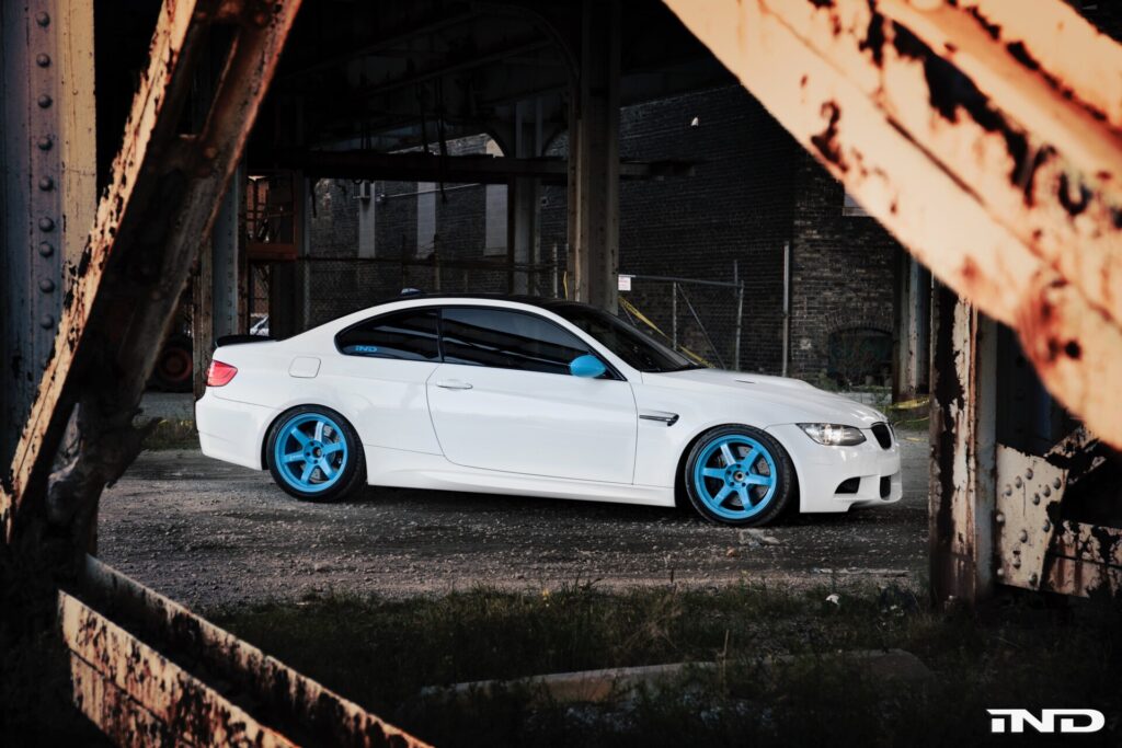 Modified BMW E92 M3 with light blue wheels Volk TE37s mirrors